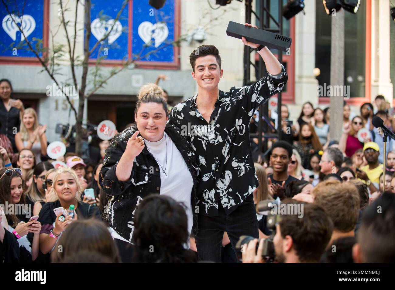 Jamie Fine, left, and Elijah Woods arrive at the 2018 iHeartRadio ...