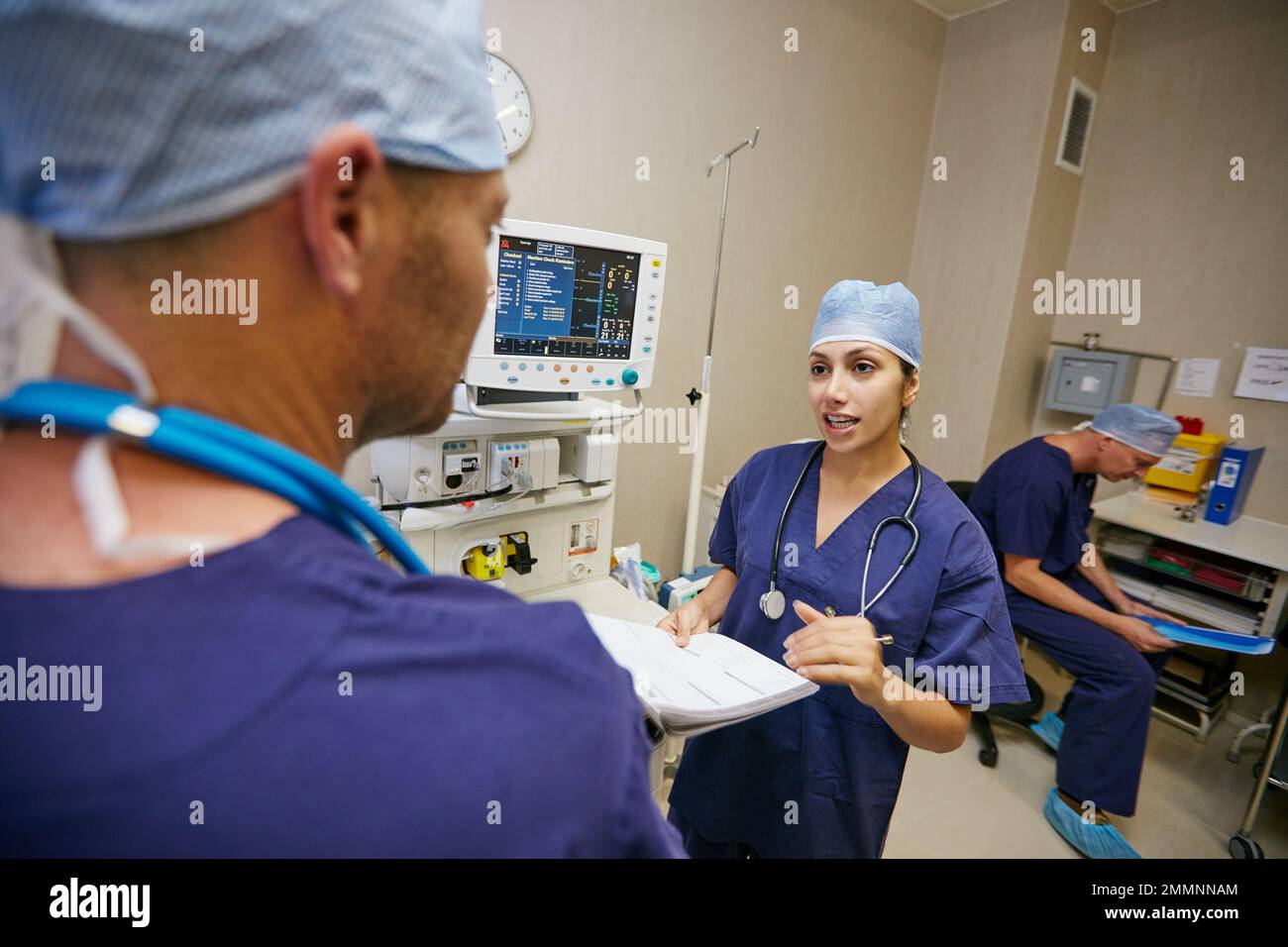 The patient has signed her consent forms. surgeons going through ...