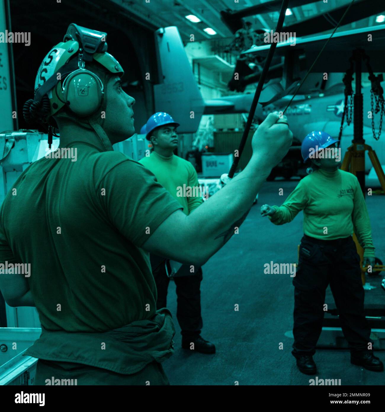 U.S. Marine Corps Sgt. Ryan Bobbitt, left, an ejection seat and ...