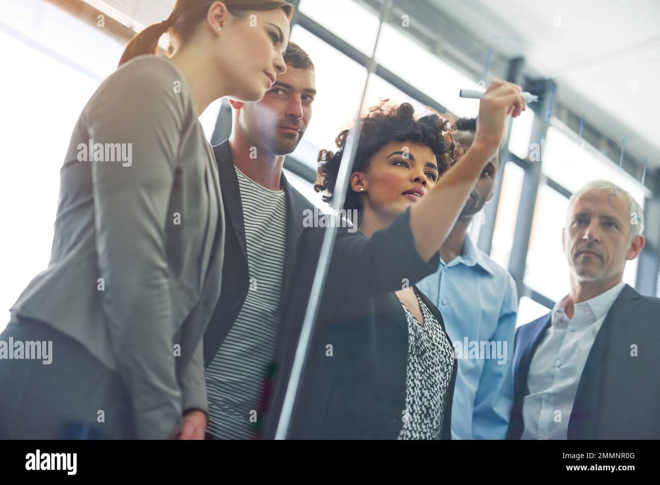 Making easy work of problem-solving. a group of colleagues having a ...
