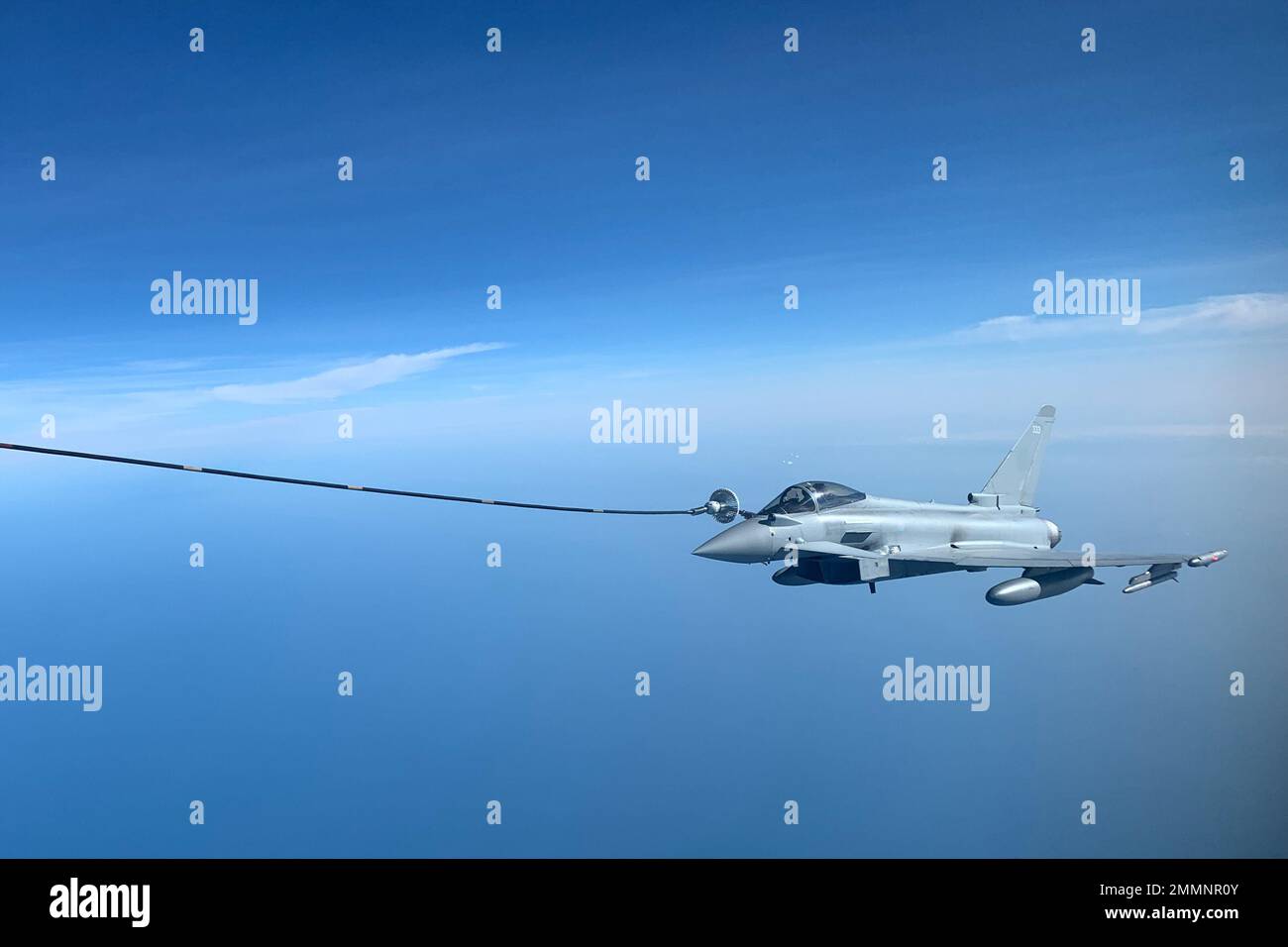 A Royal Air Force Eurofighter Typhoon aircraft receives fuel over the ...