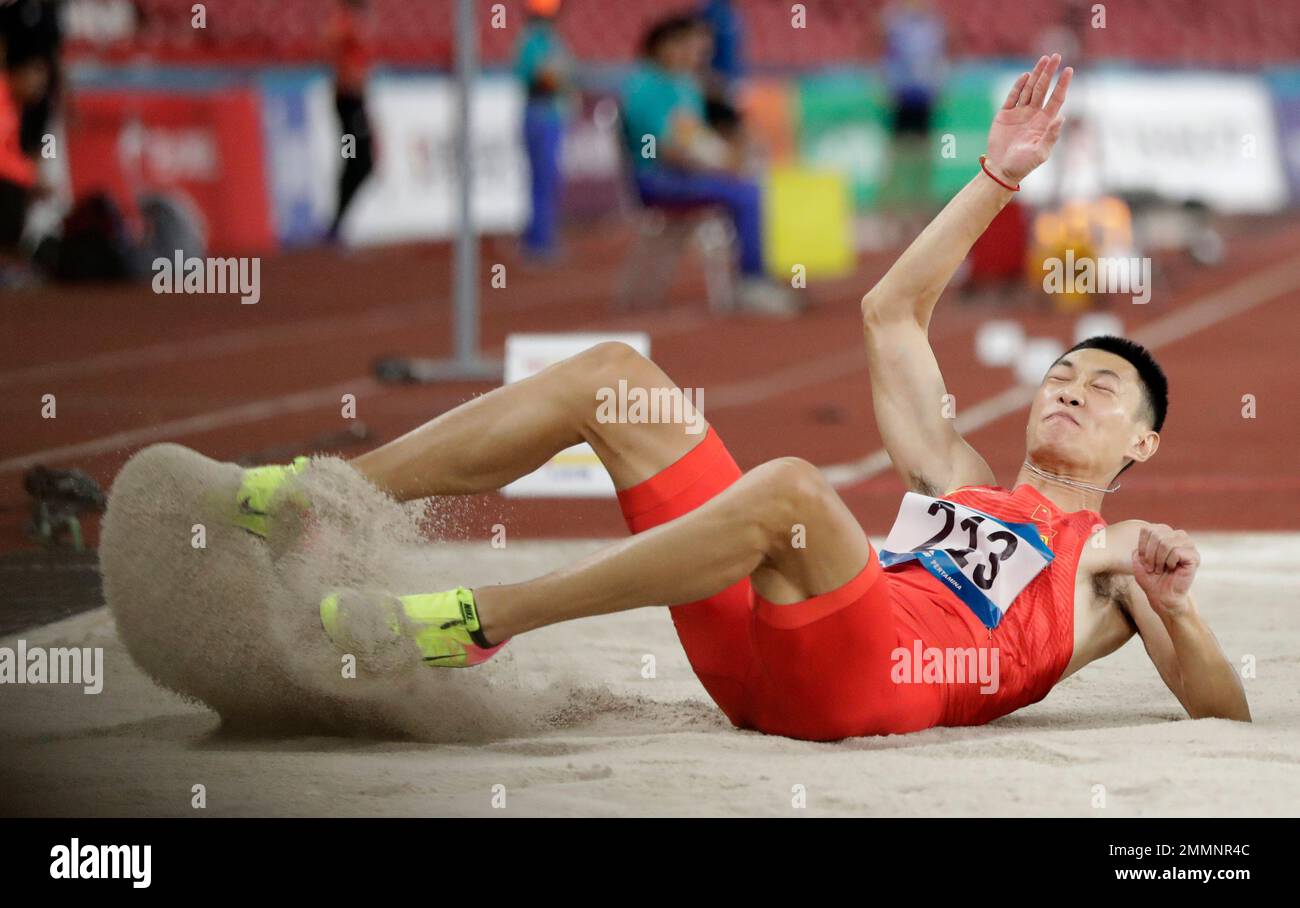 China's Wang Jianan competes in the men's long jump final during the ...