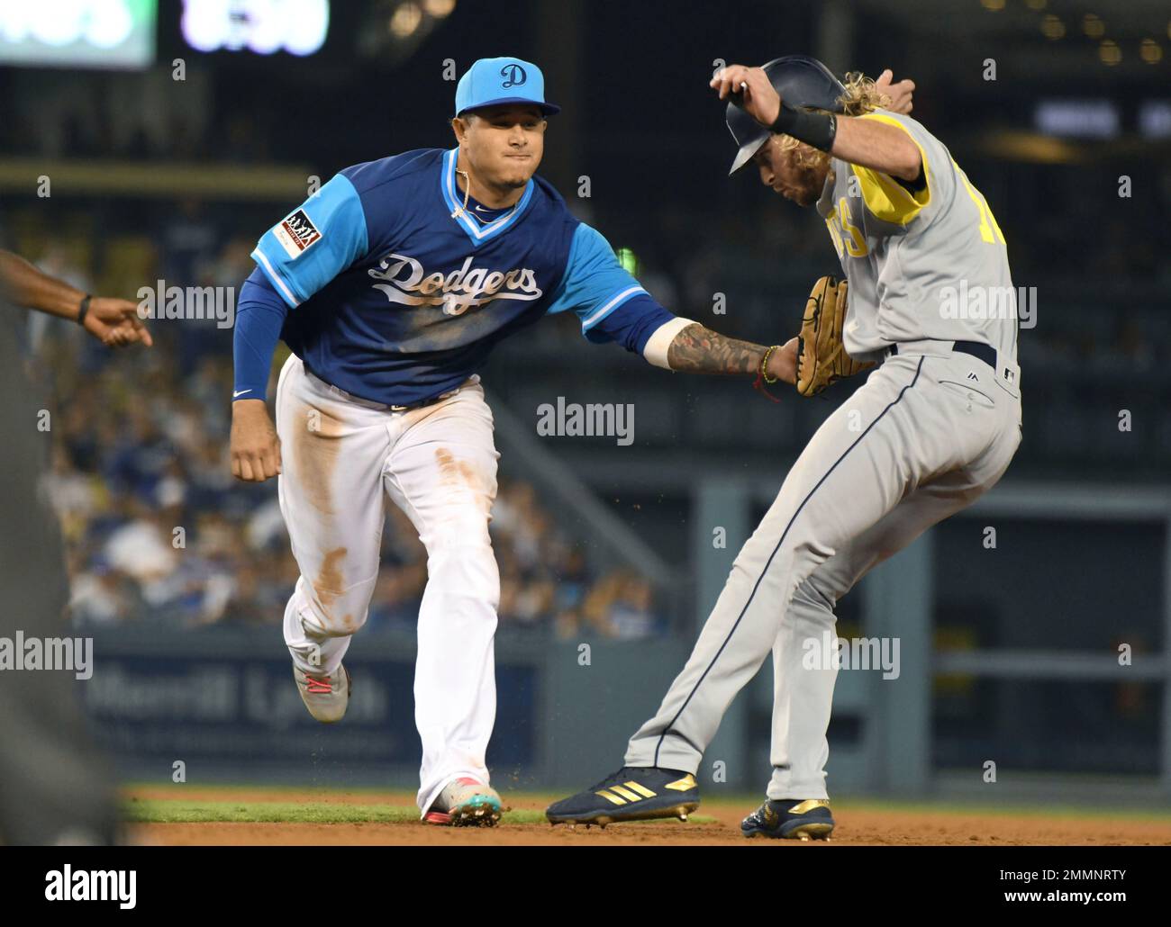 Los Angeles Dodgers shortstop Manny Machado tags out San Diego Padres ...