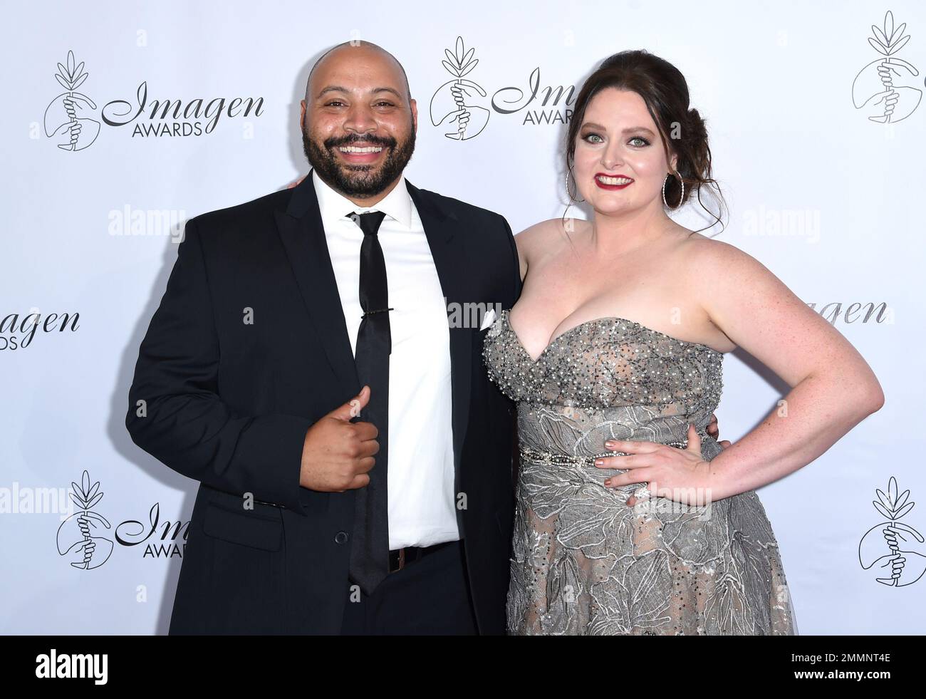 Colton Dunn, left, and Lauren Ash arrive at the 33rd annual Imagen ...