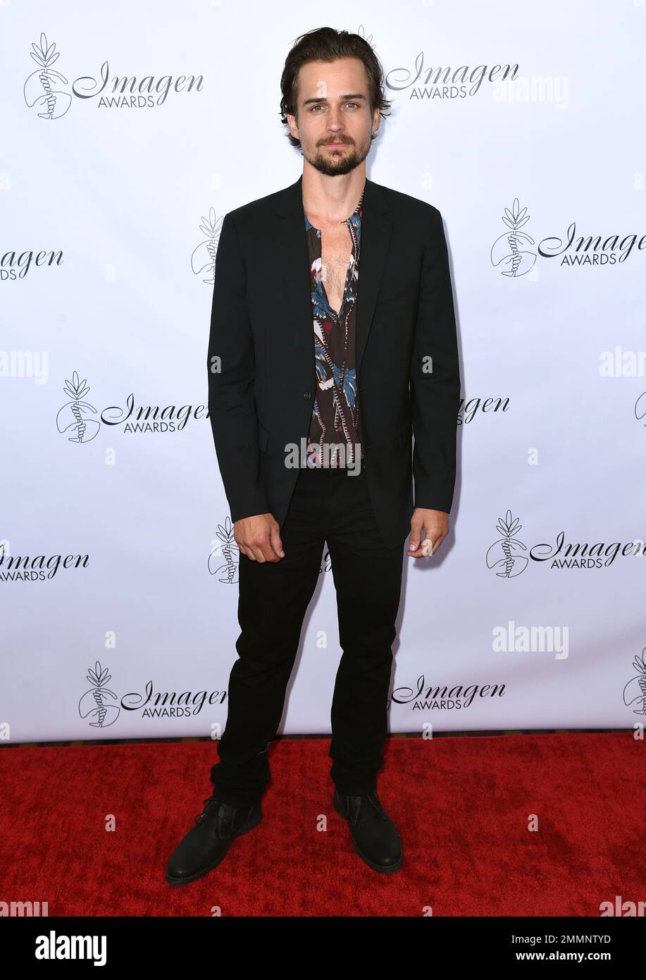 Jon-Michael Ecker arrives at the 33rd annual Imagen Awards on Saturday ...