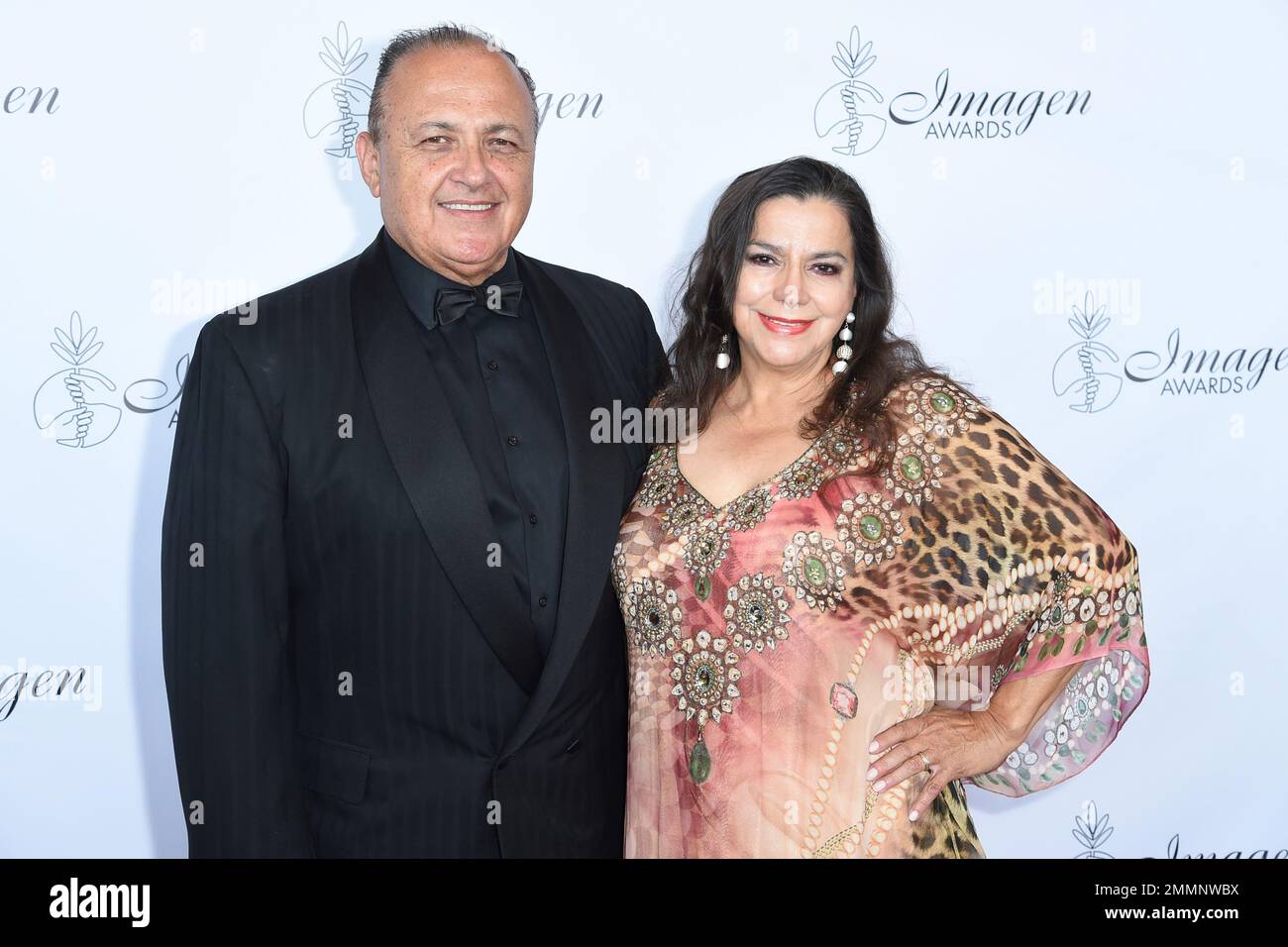 AL Aguilar, left, and Gisela Girard arrive at the 33rd annual Imagen ...