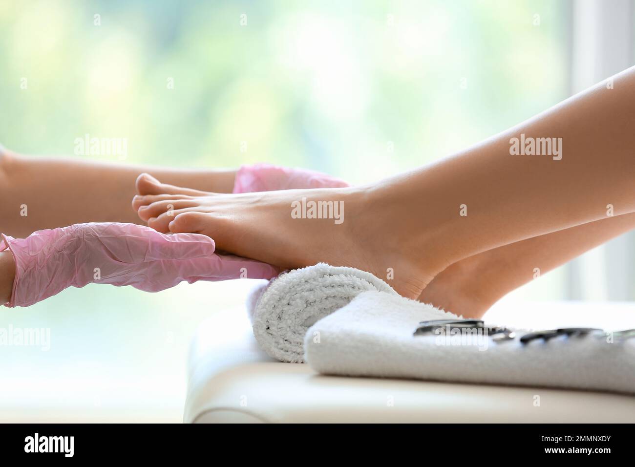 Young woman getting pedicure in beauty salon, closeup Stock Photo - Alamy