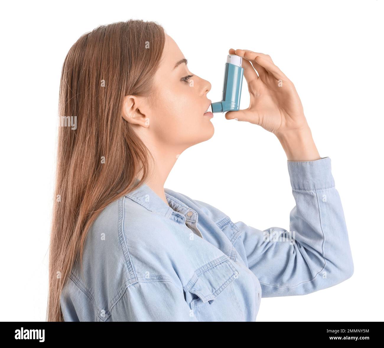 Young woman with inhaler on white background Stock Photo - Alamy