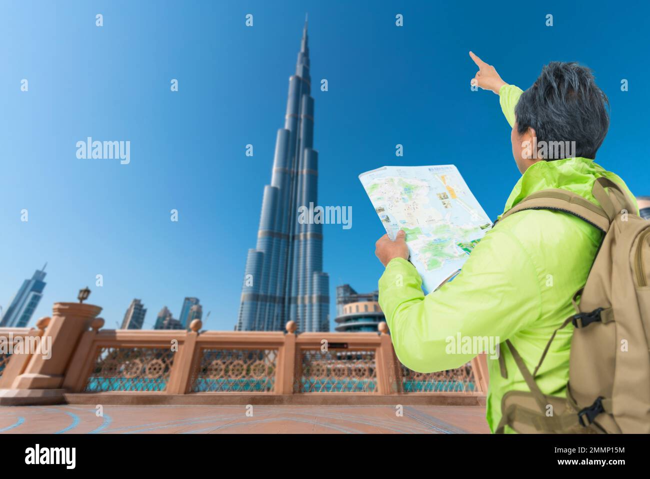 Happy in old people holding a map to the distance Stock Photo - Alamy