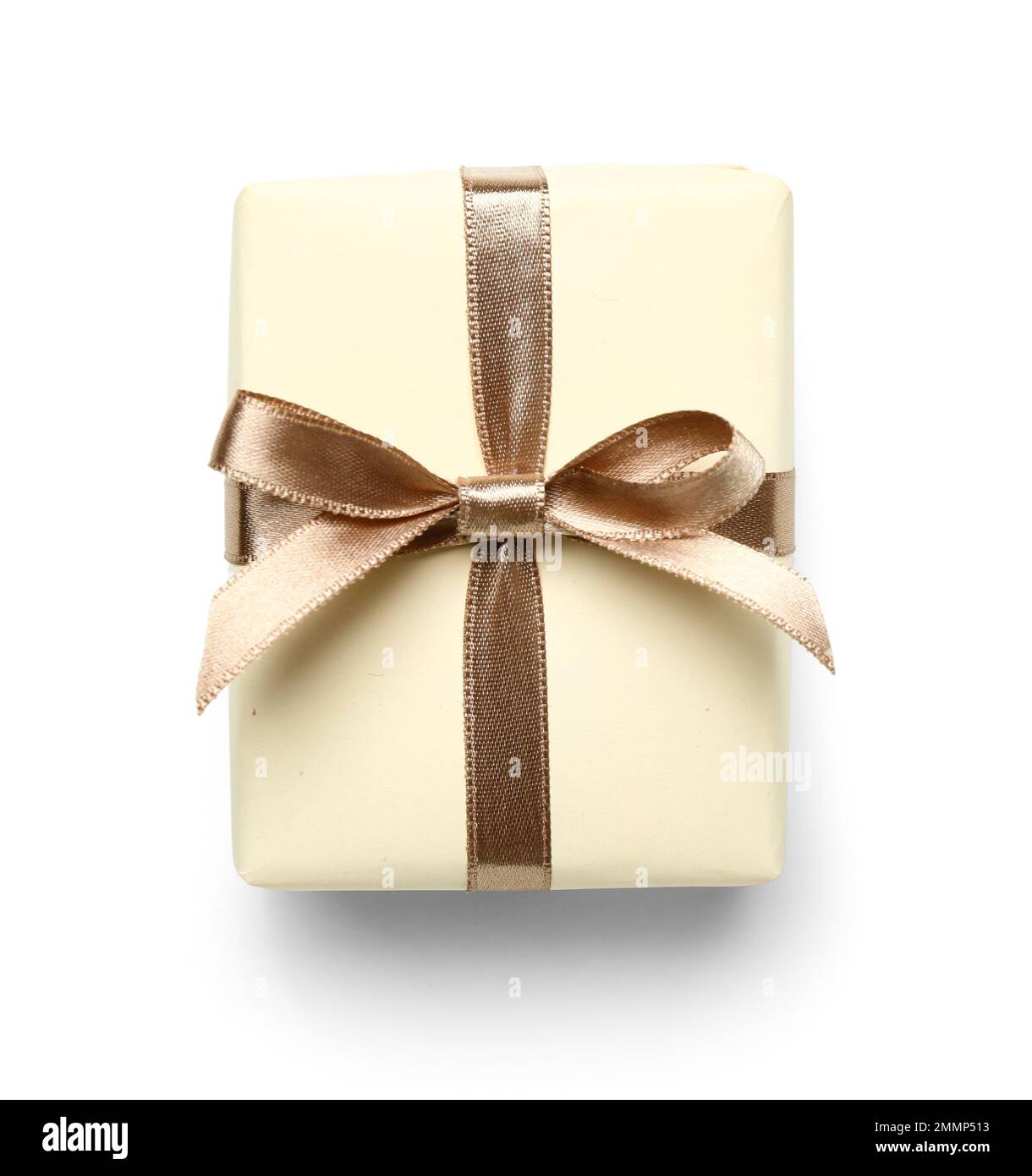 Gift box tied with silk ribbon on white background Stock Photo - Alamy