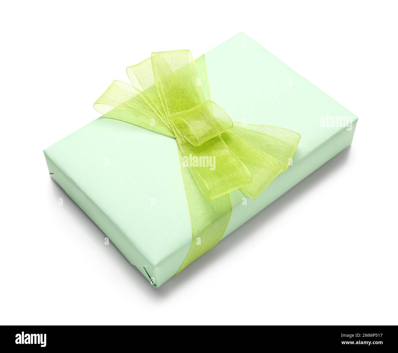 Gift box with green ribbon on white background Stock Photo - Alamy