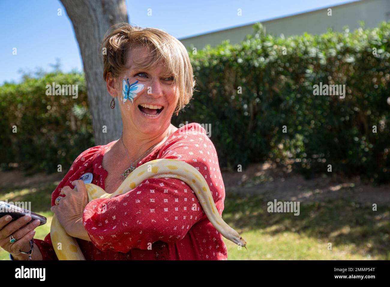 Jennifer Thrasher, bowling manager, spends a little quality time with a ...