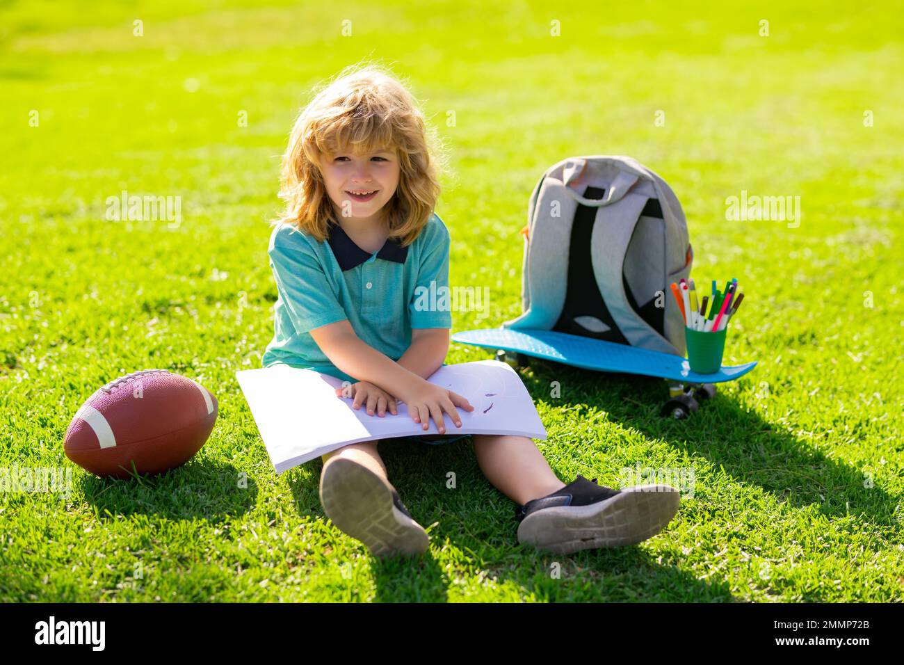 Little painter draw pictures outdoor. Child drawing picture with crayon ...