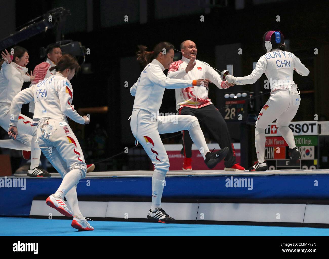 China team members celebrate after defeating South Korea during their ...