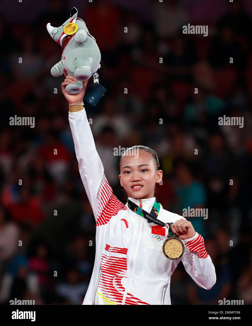 China's Chen Yile stands on the podium after winning gold medal in the ...