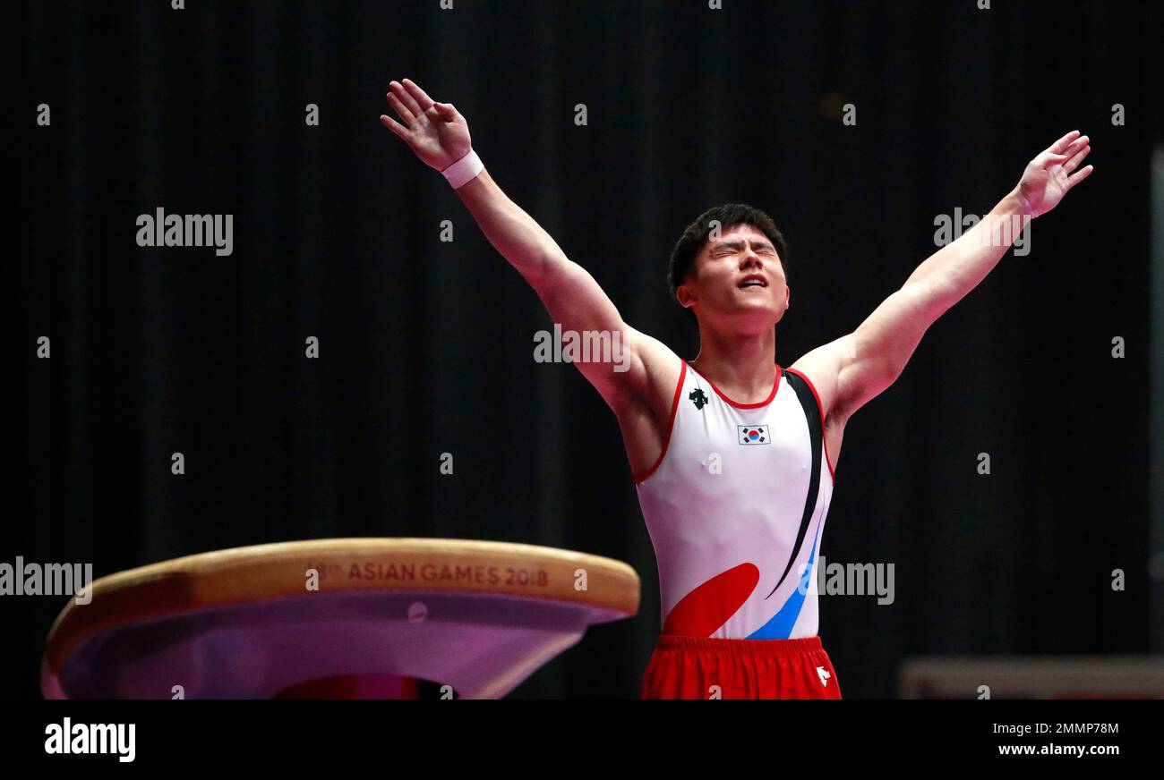 South Korea's Kim Han-sol performs on the vault during the men's ...