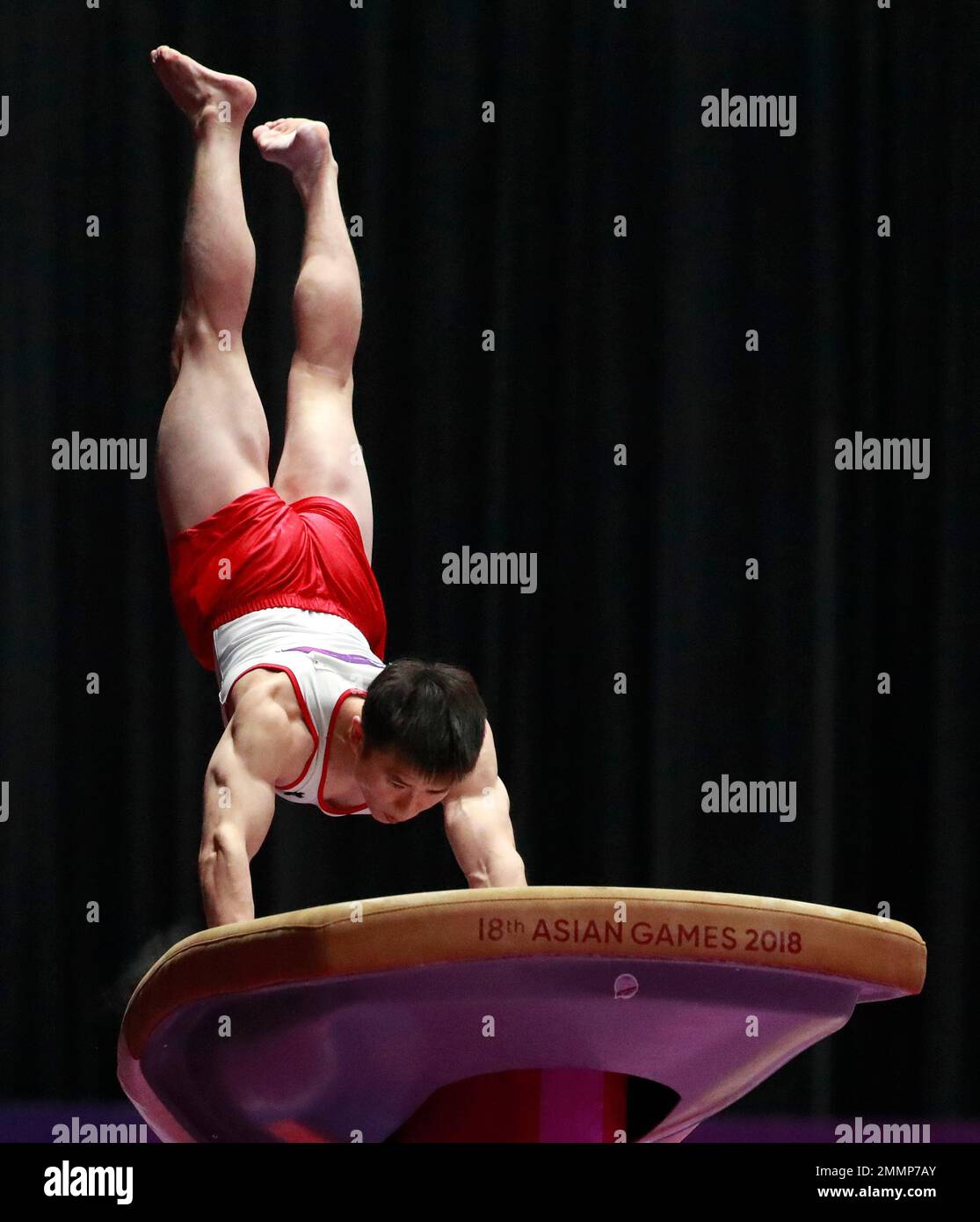 South Korea's Kim Han-sol performs on the vault during the men's ...