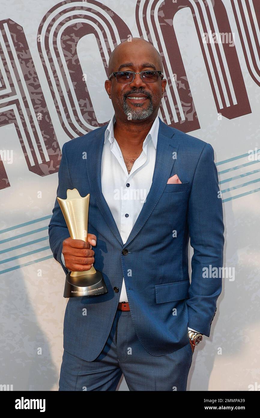 Darius Rucker, with his ACM Gary Haber Lifting Lives Award, arrives at ...