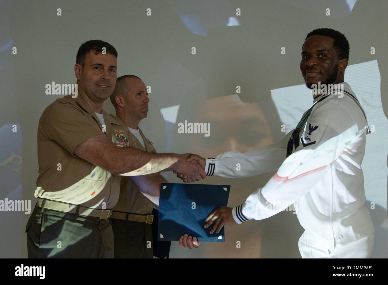 U.S. Navy Petty Officer 3rd Class Lionel Kone, a Côte d’Ivoire native ...