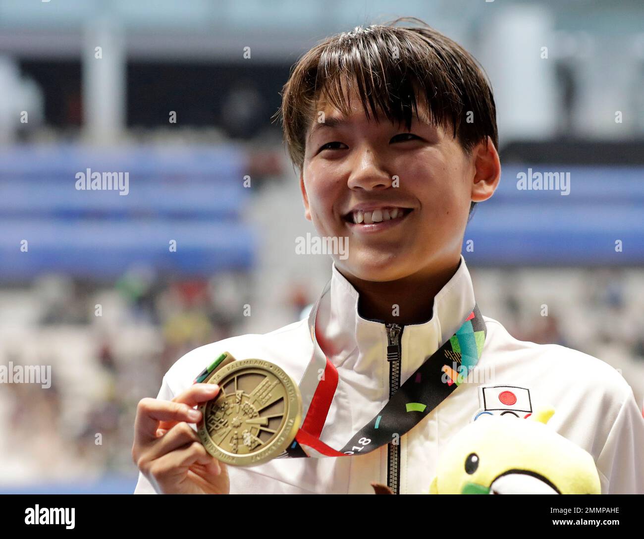Japan's Waka Kobori holds her bronze medal following the women's 800m ...