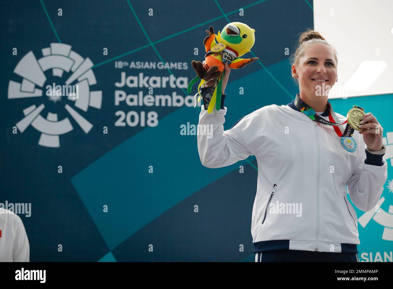 CAPTION CORRECTION CORRECTS NAME: Bonze medalist Kazakhstan’s Mariya ...