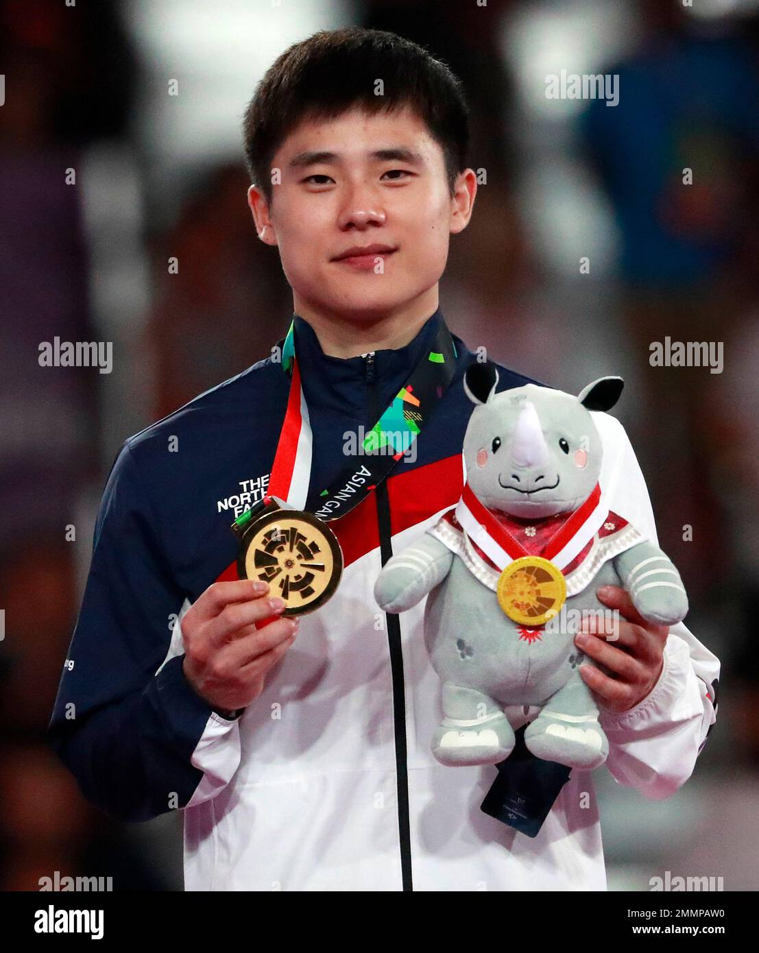 South Korea's Kim Han-sol holds his gold medal during the medal ...