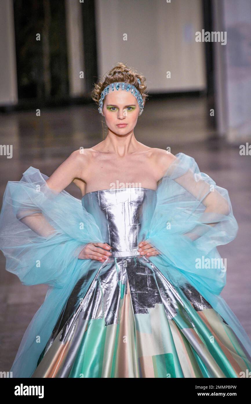 A model walks the runway during the Georges Chakra Haute Couture Spring ...