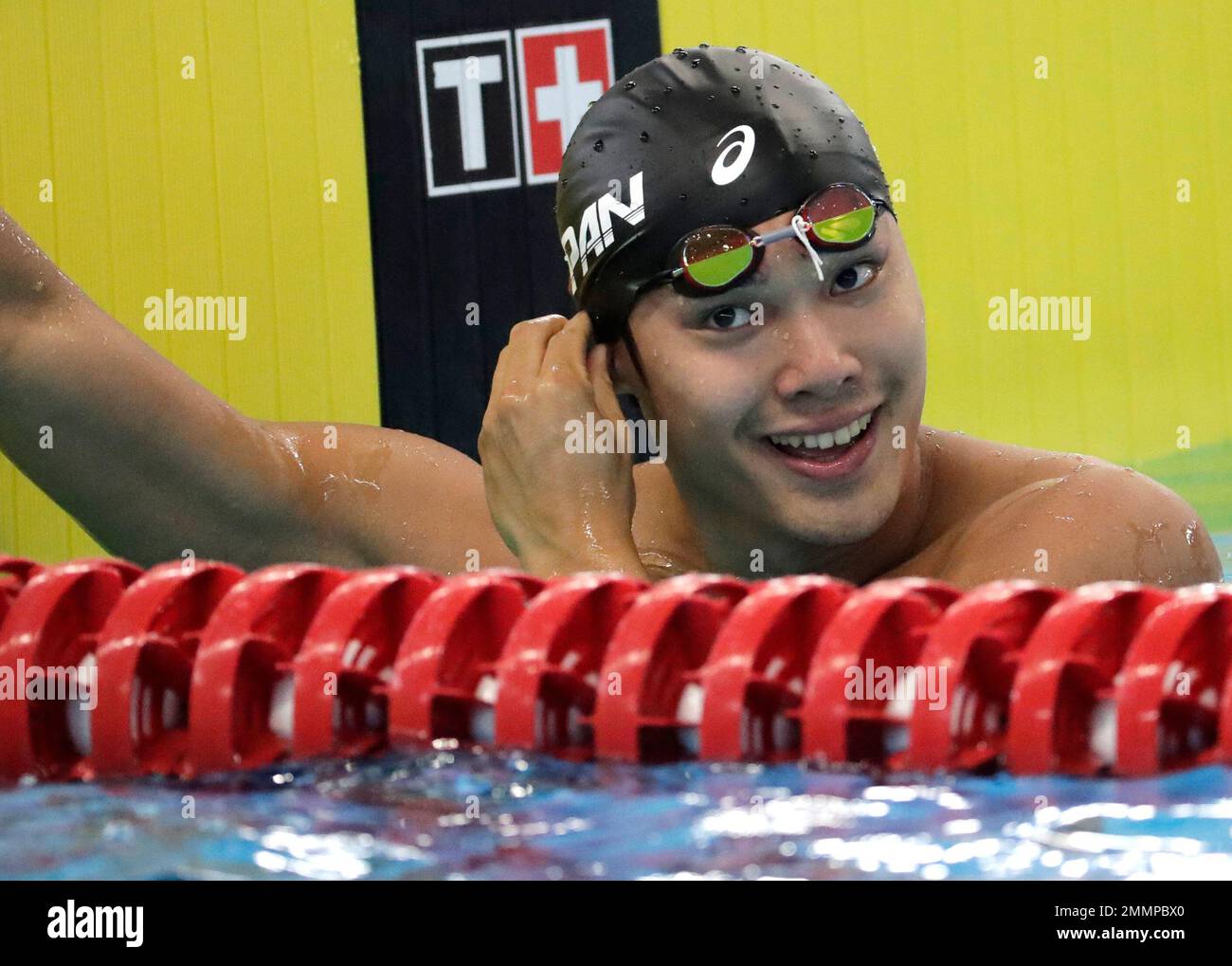 Japan's Katsumi Nakamura reacts after his heat of the men's 100m ...