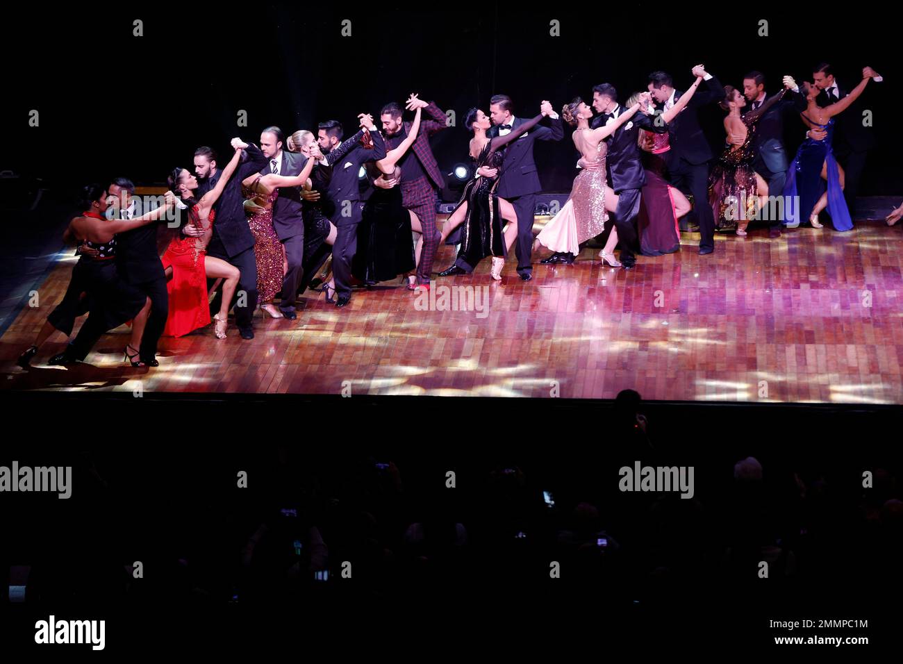 Tango couples dance during the stage category at the World Tango ...