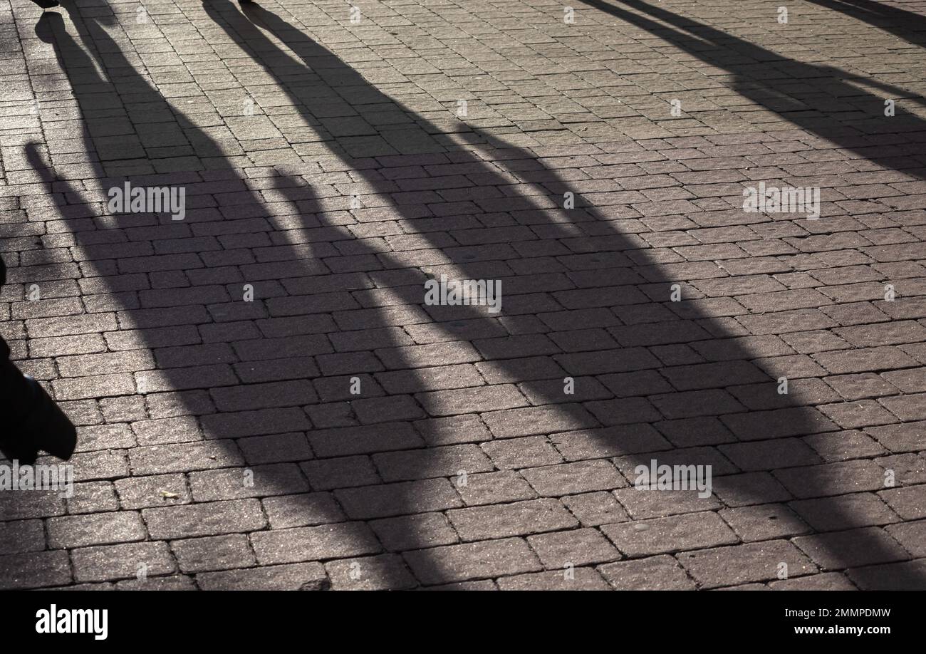 Silhouette people walking on road hi-res stock photography and images ...