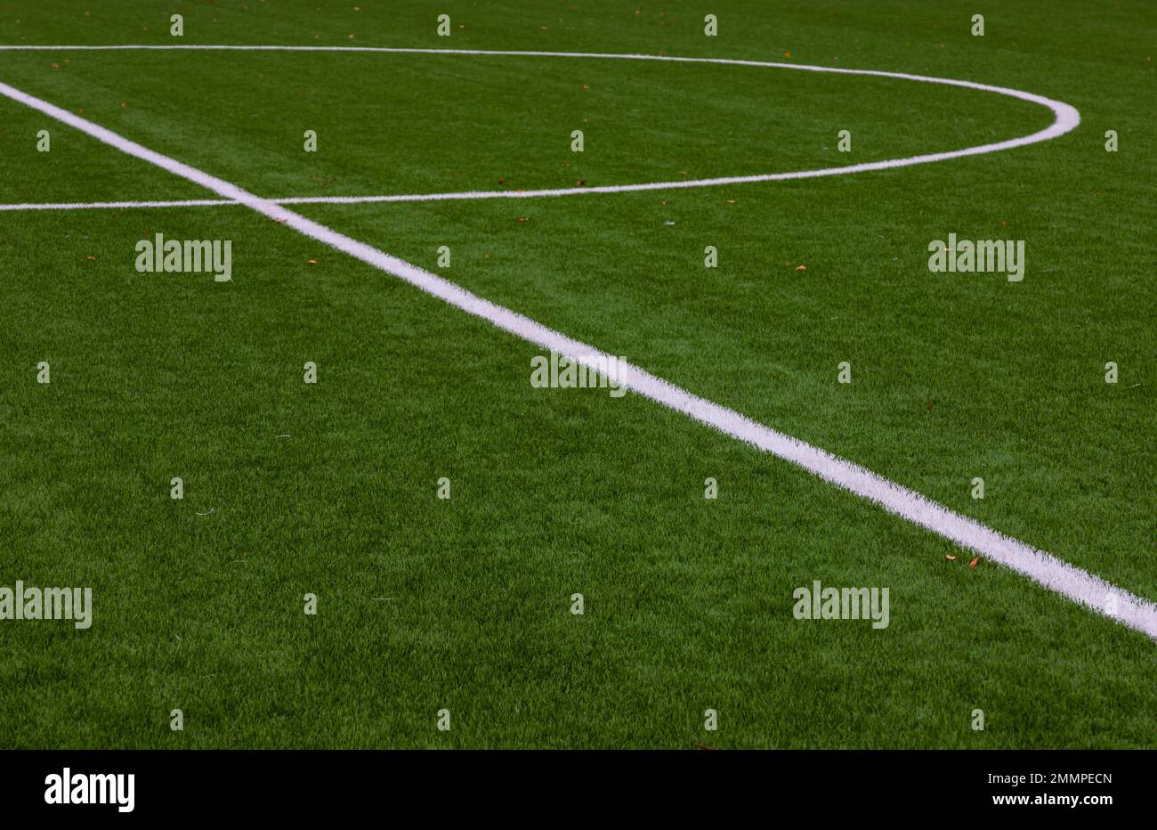 Photo of a green synthetic grass sports field with white line shot from ...