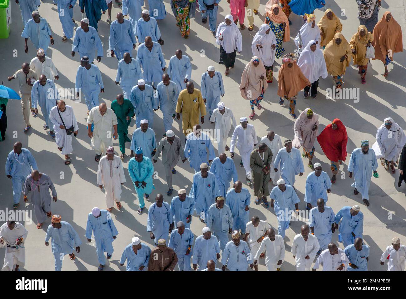 Muslim pilgrims on the annual hajj pilgrimage walk towards Jamarat to ...