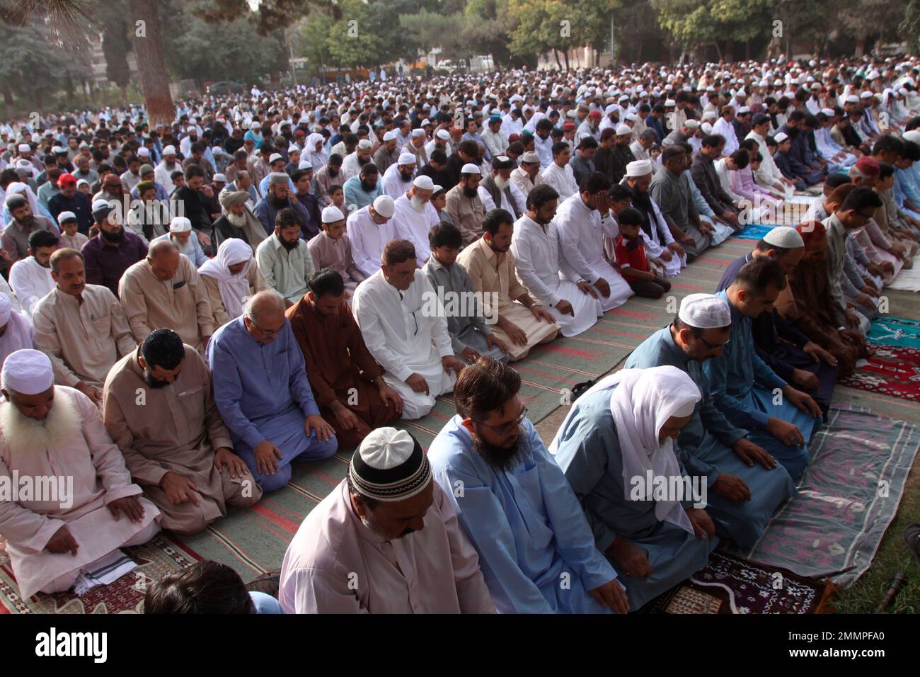 Pakistani Muslims pray during the Eid al-Adha holiday, in Quetta ...