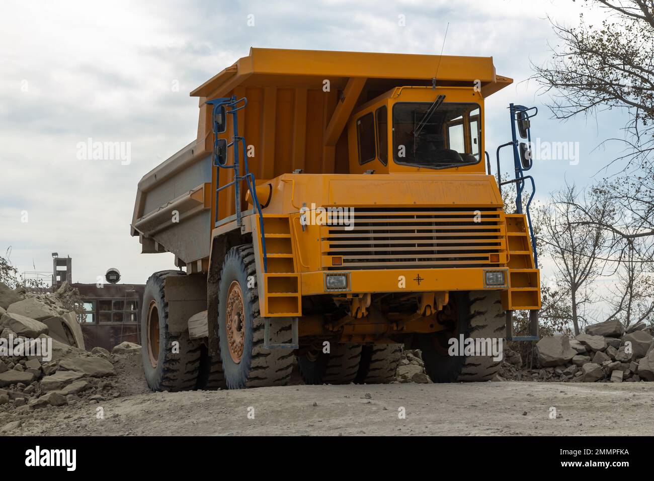 Large mining dump truck. Transport industry. Extraction of stone in an ...