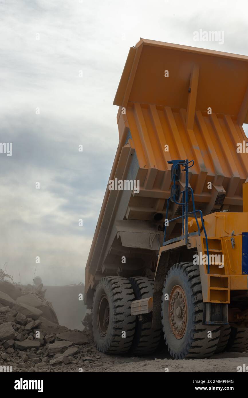 Large mining dump truck. Transport industry. Extraction of stone in an ...