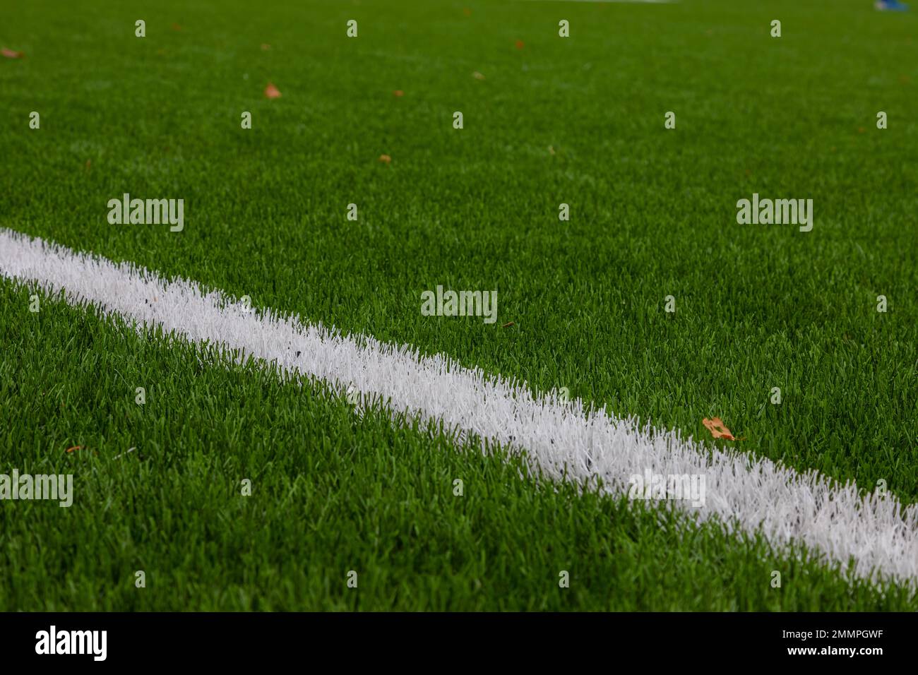 Photo of a green synthetic grass sports field with white line shot from ...