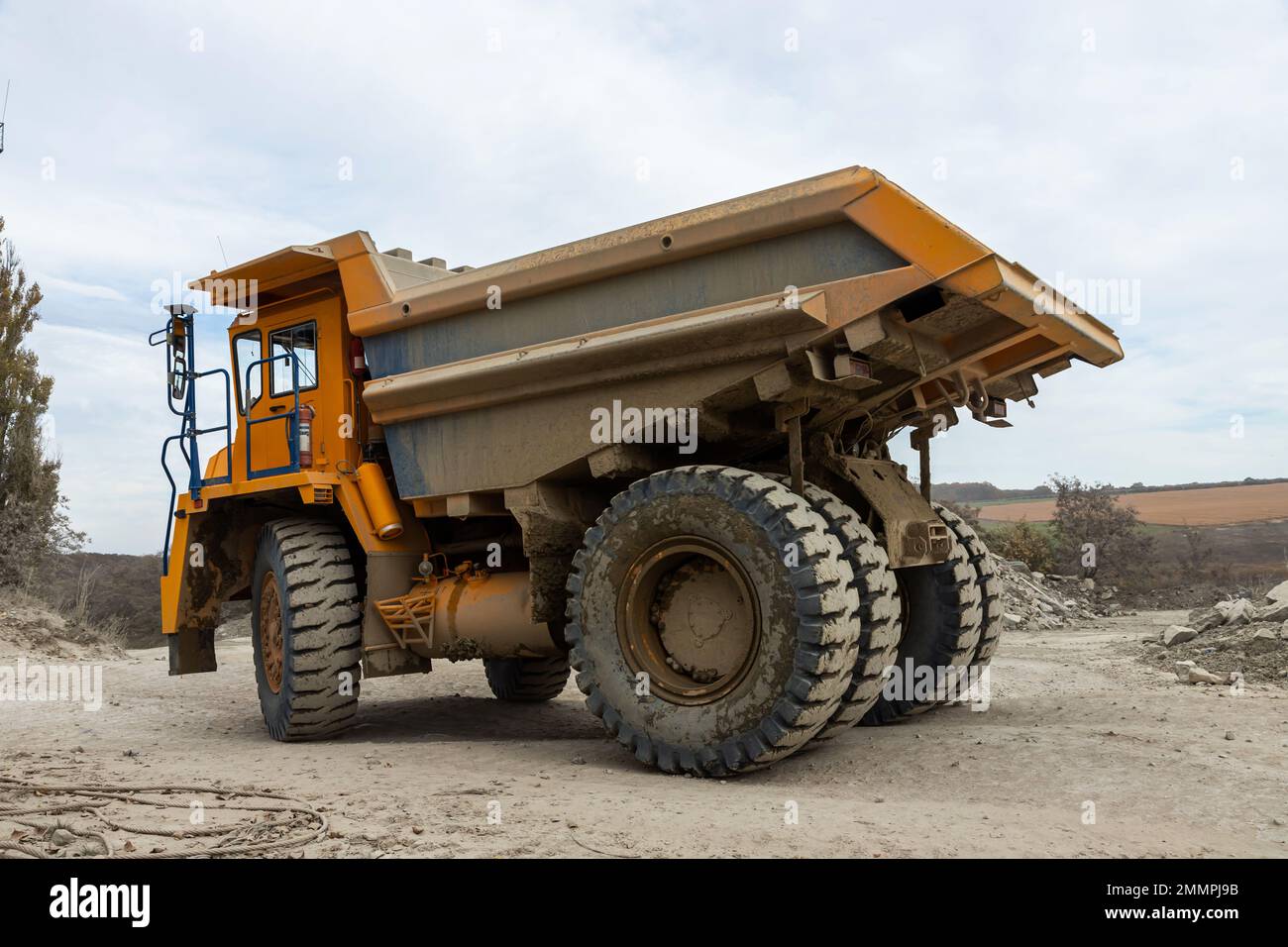 Large mining dump truck. Transport industry. Extraction of stone in an ...