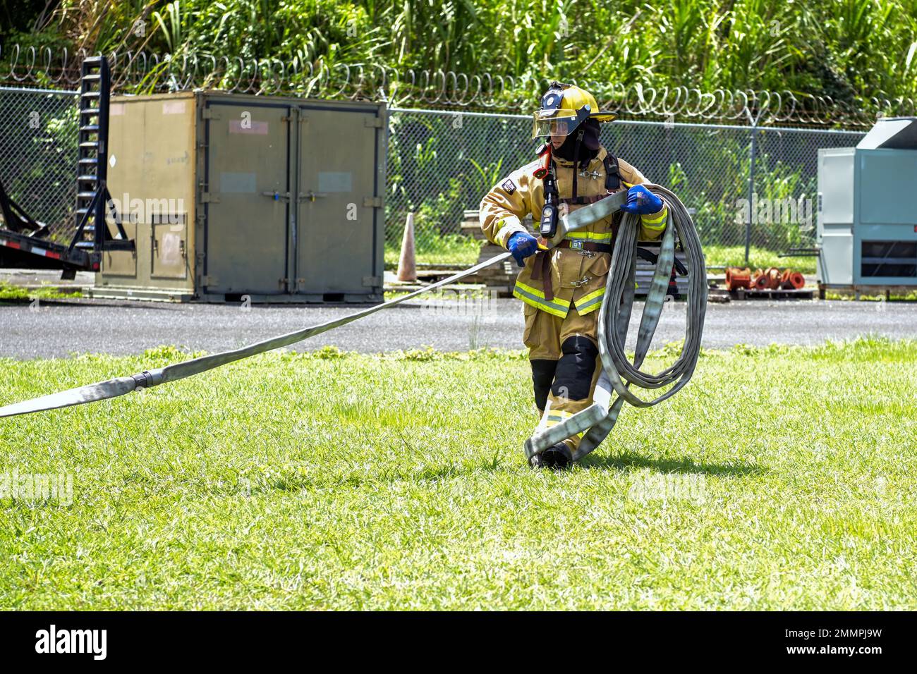 U.S. Air Force Airman 1st Class Wilson Irizarry, a firefighter with the ...