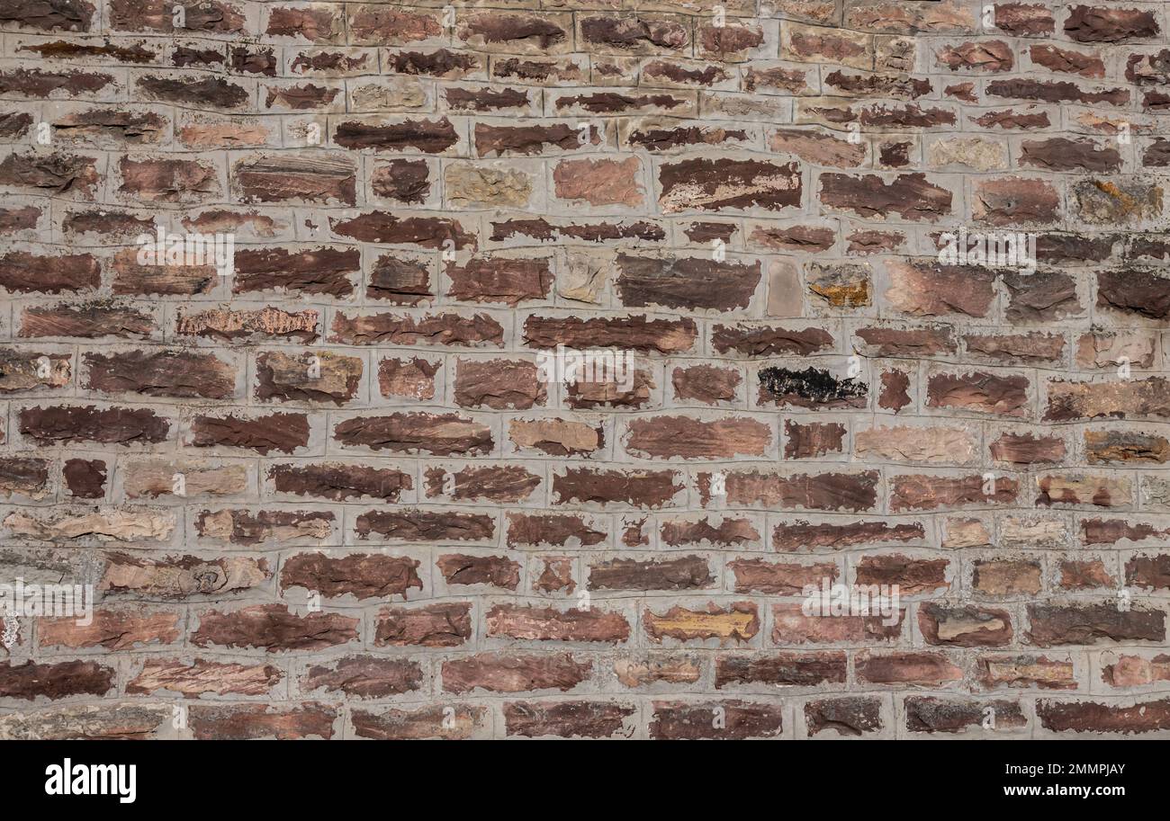 Stone wall texture background natural color. Closeup Stock Photo - Alamy