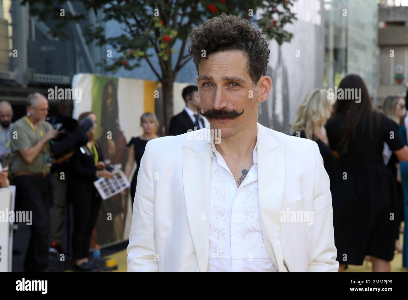 Screenwriter Brock Norman Brock poses for photographers on arrival at ...