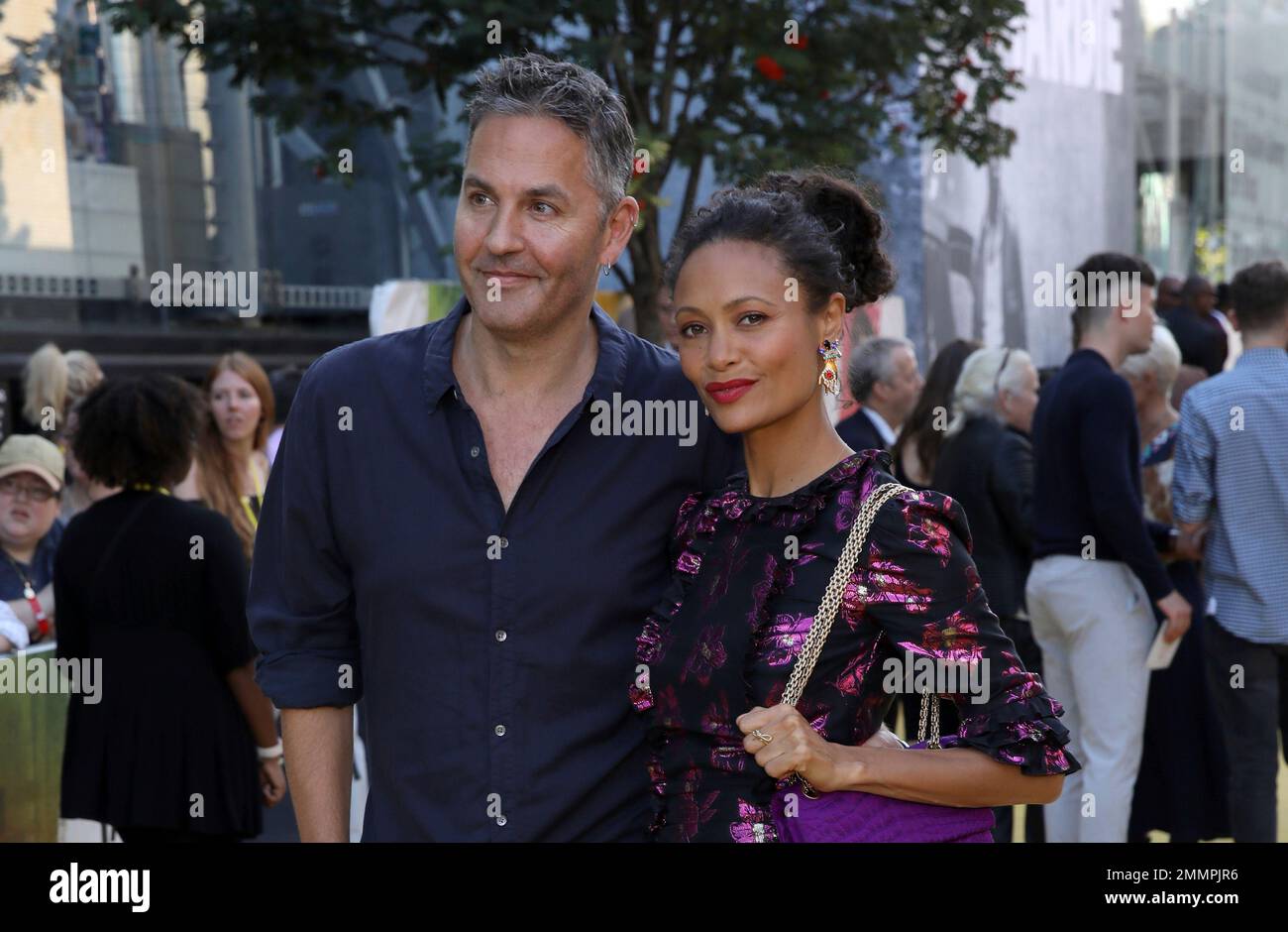 Actress Thandie Newton, right, and partner Oliver Parker pose for ...