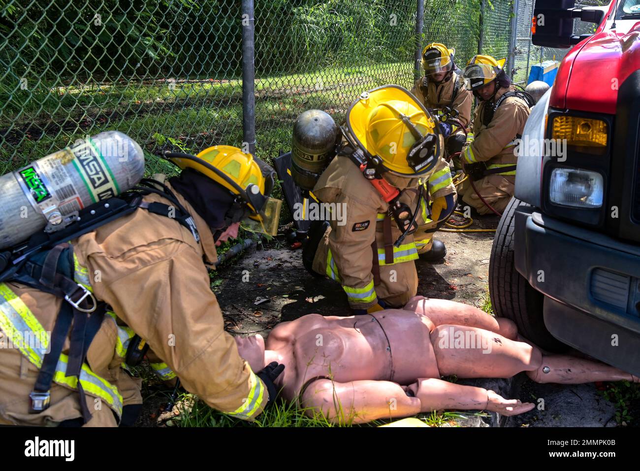 U.S. Air Force firefighters with the 156th Fire Emergency Services ...