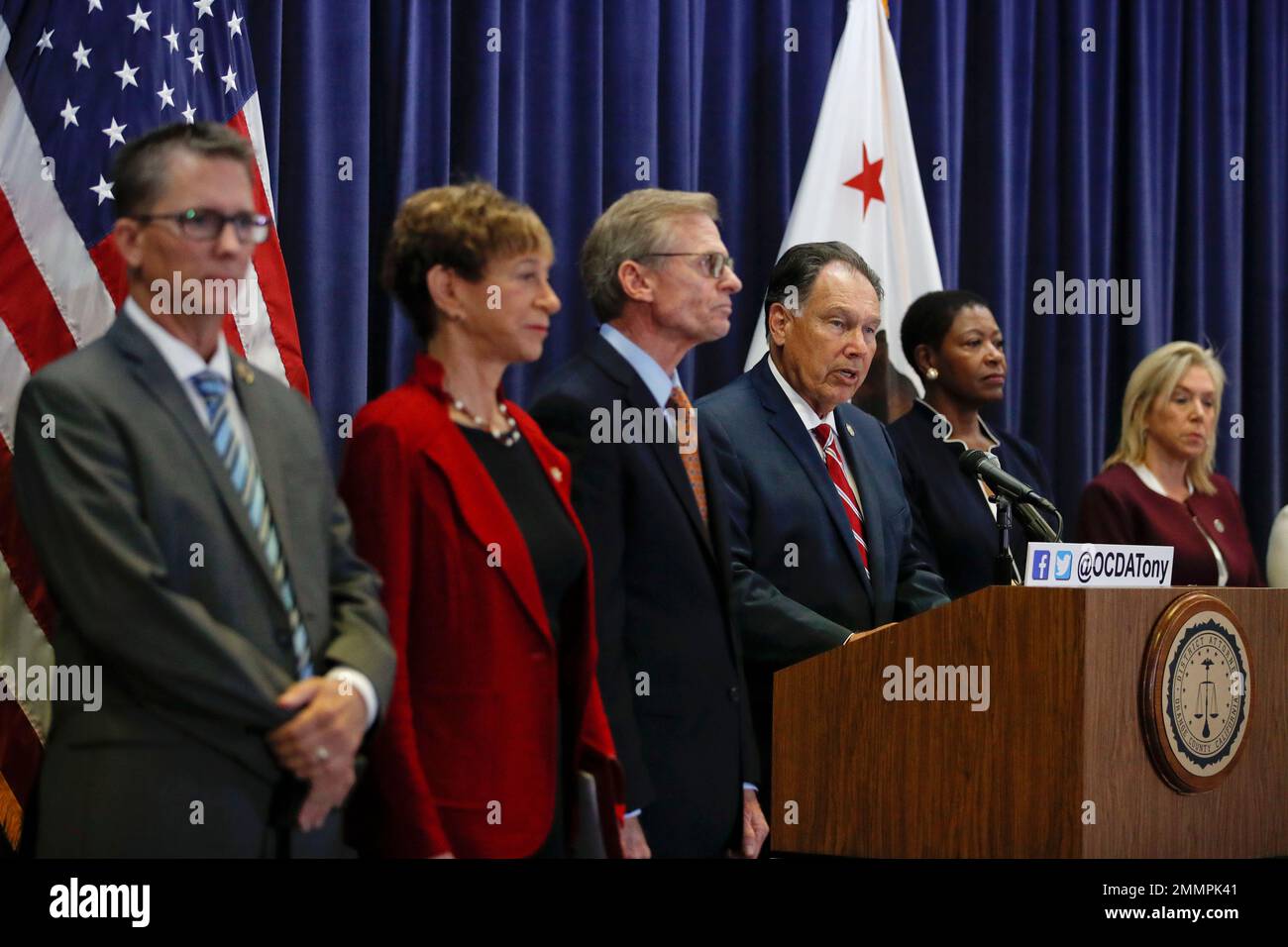 Orange County District Attorney Tony Rackauckas, fourth from left ...