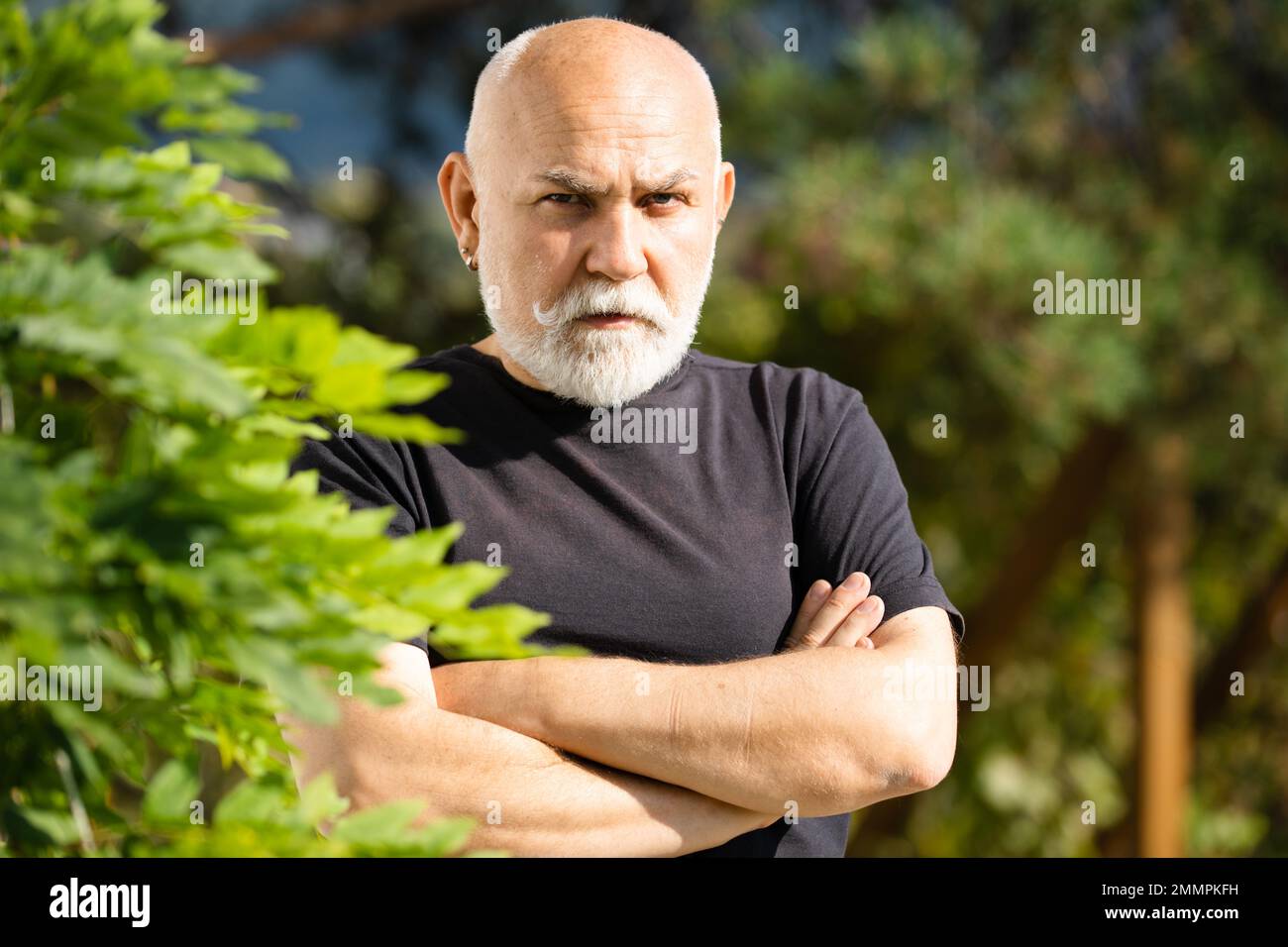 Grandfather. Portrait of serious expression 60 year old elder senior ...