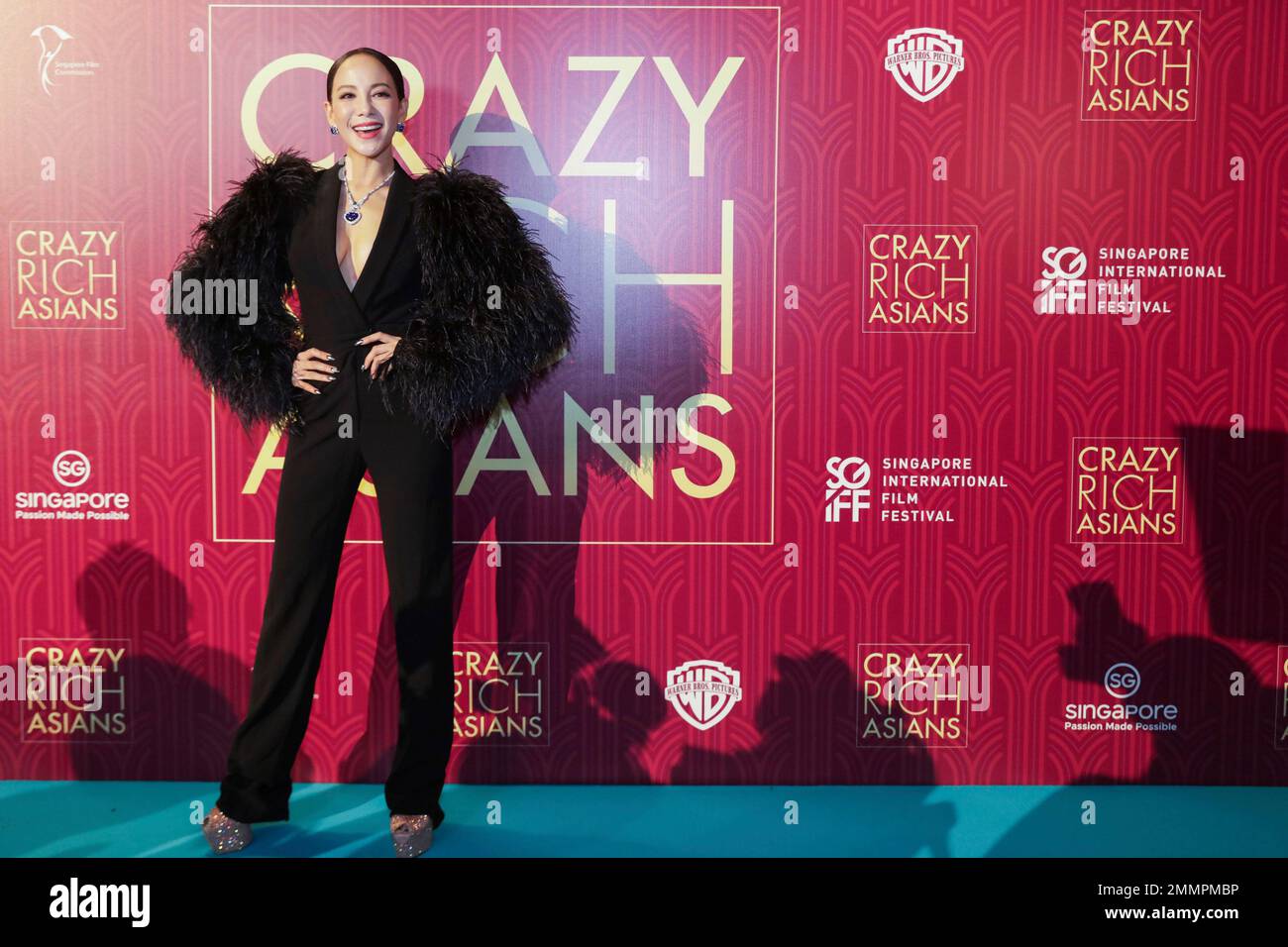 Actress Fiona Xie poses for photographers as she arrives for the red ...