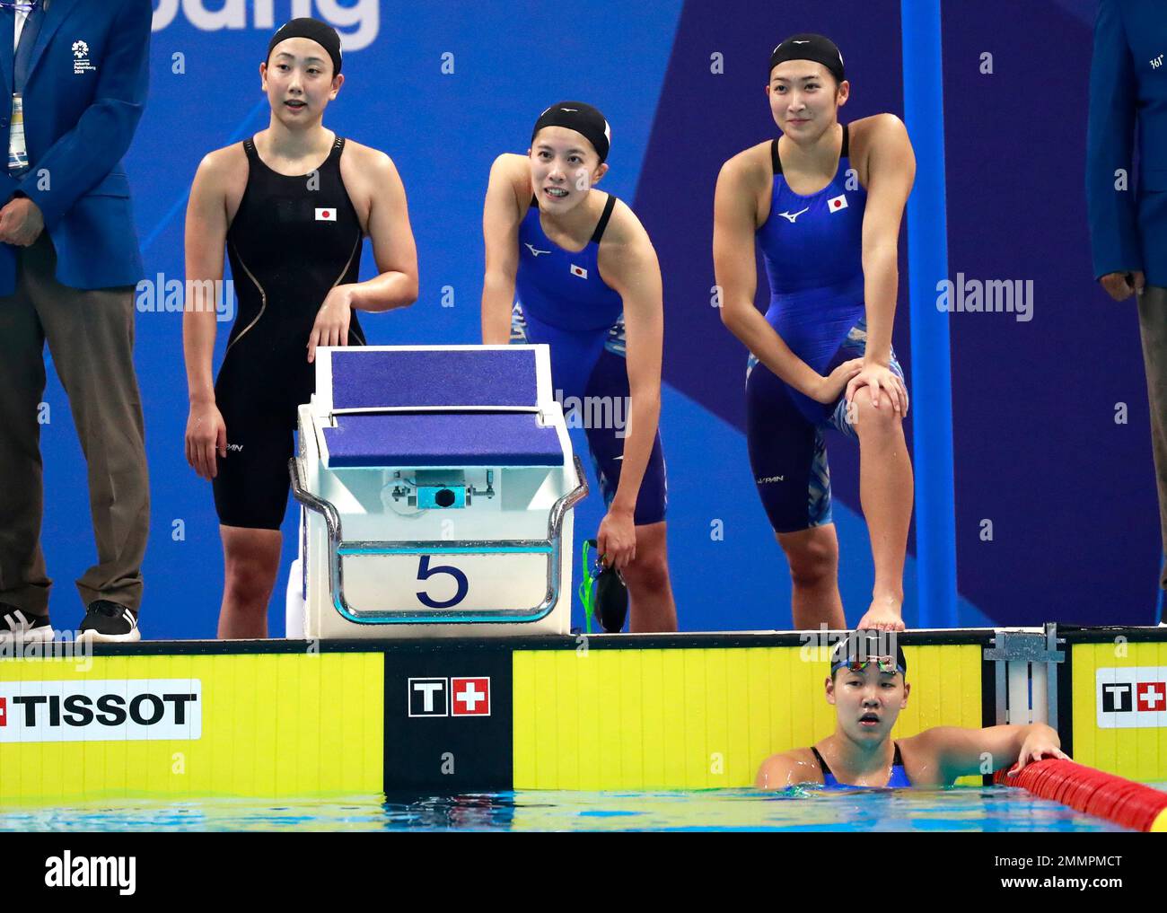 The Japanese team react after their second place finish in the women's ...