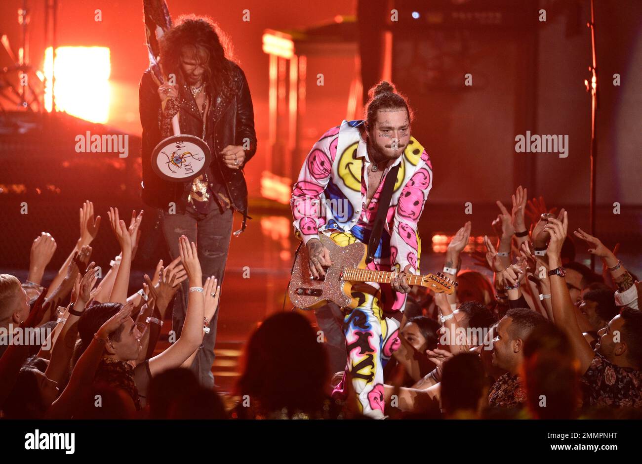 Steven Tyler of Aerosmith, left, performs with Post Malone at the MTV ...