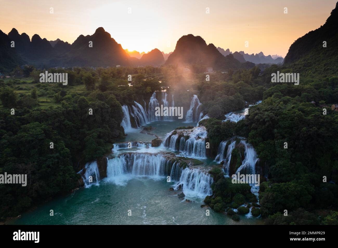 Ban Gioc Detian waterfall in sunset, the largest waterfall in Southeast ...