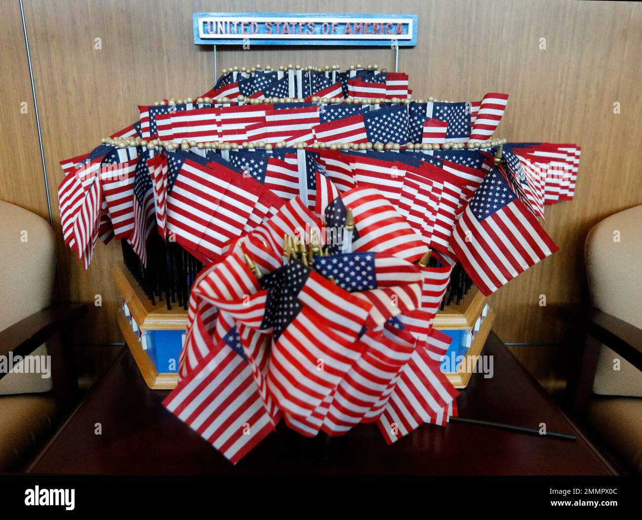 American flags are shown before the start of a naturalization ceremony ...