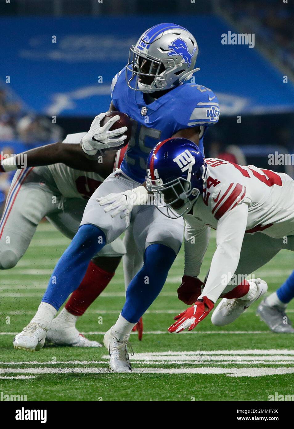 New York Giants cornerback Eli Apple (24) tackles Detroit Lions running ...